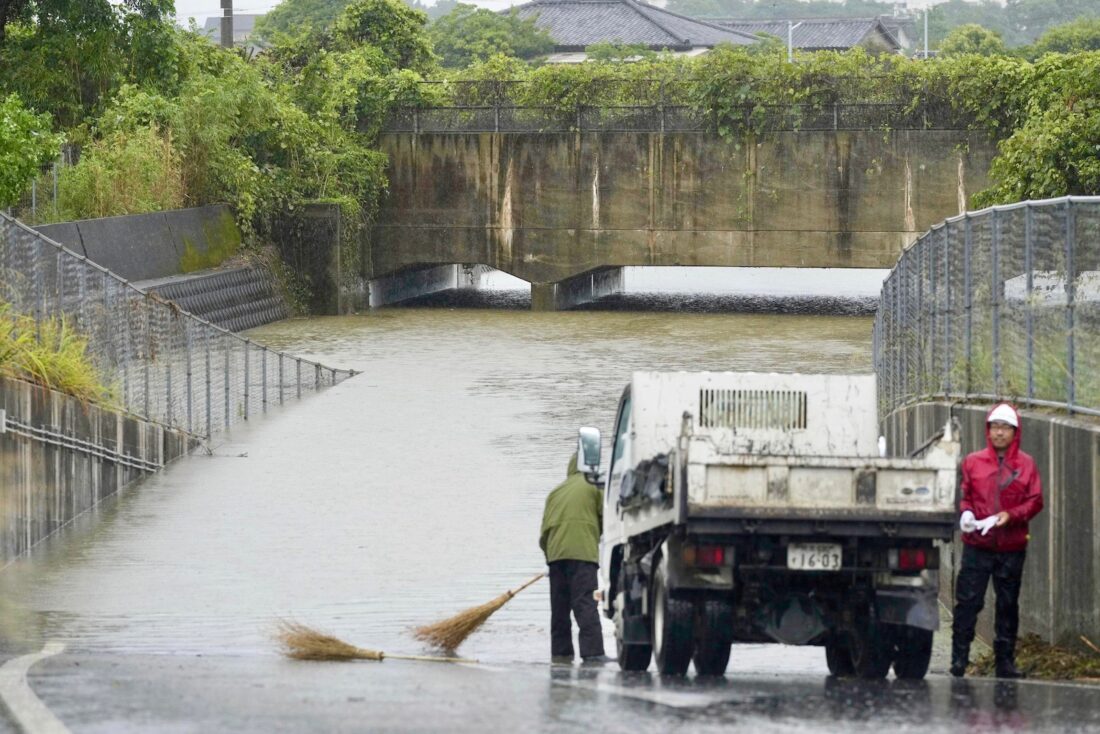 Torrential rains in southern Japan cause flooding, mudslides and travel ...